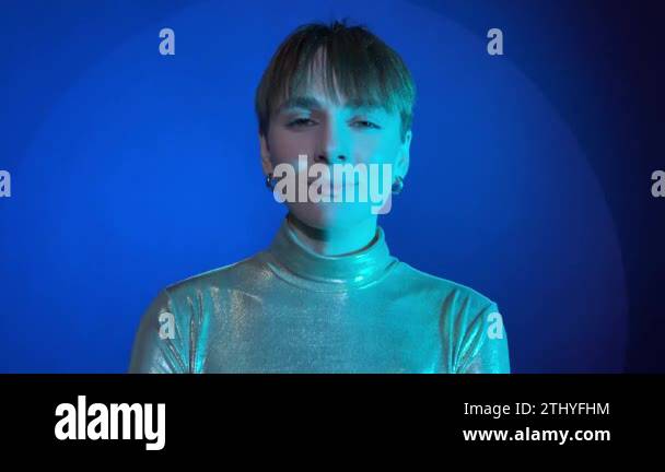 Portrait young adult woman having mad stare, evil laughing while alarm ...