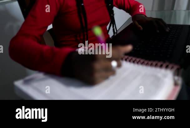 Teen African girl doing homework at night, black adolescent female ...