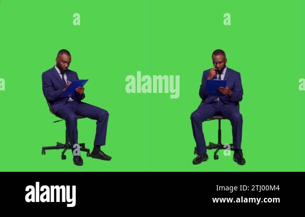 African american businessman taking notes on files, thinking about new ...