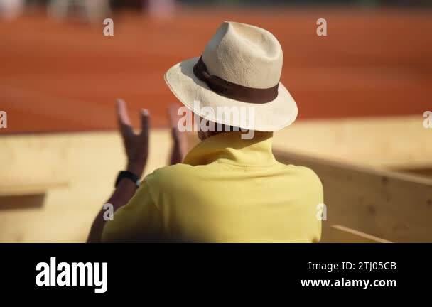 Spectator watching tennis match game clapping hands cheering from ...