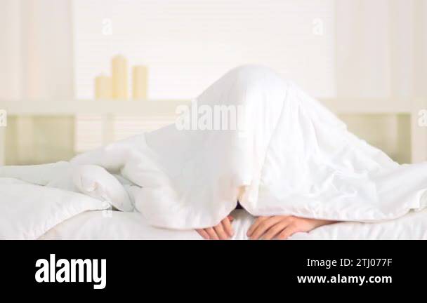 Woman under bed covers Stock Videos & Footage - HD and 4K Video Clips ...