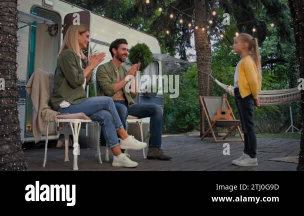 Happy proud parents Caucasian mother and father family sitting in ...