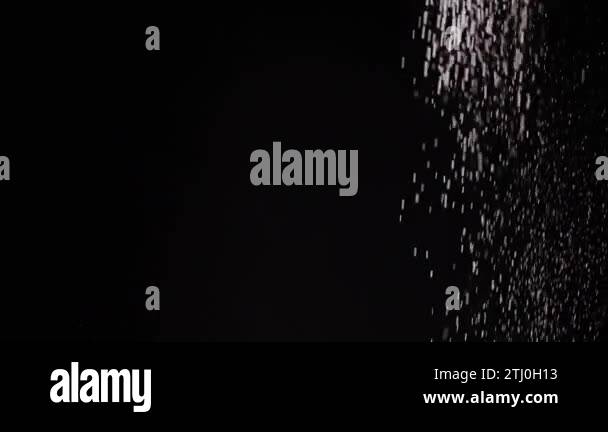 Stream Falling Particles, Sparks, Dust, Debris, Powder on Black ...