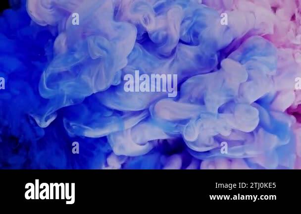 Blue ink water explosion from the left side. Watercolor ink in water on ...