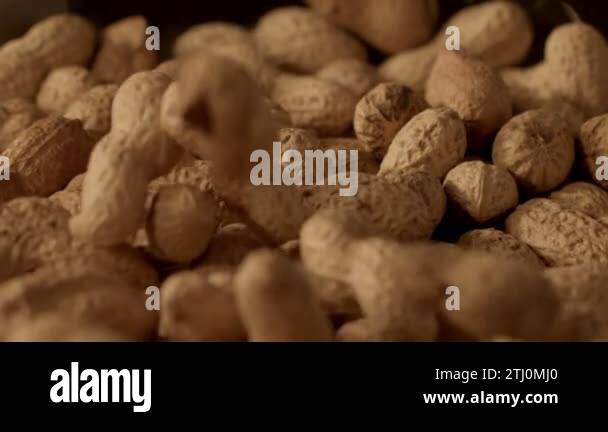 Peanuts falling Stock Videos & Footage - HD and 4K Video Clips - Alamy