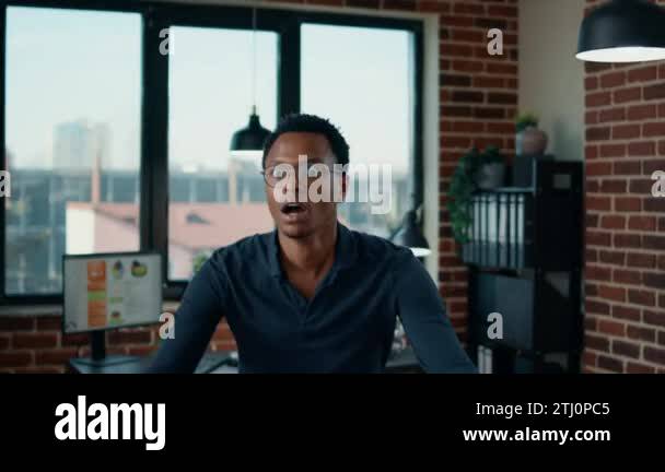 Shocked man in office running away from ferocious brain-eating zombies ...