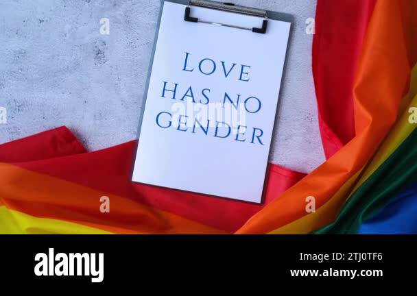 4k zoom in out Rainbow flag with text LOVE HAS NO GENDER message paper ...