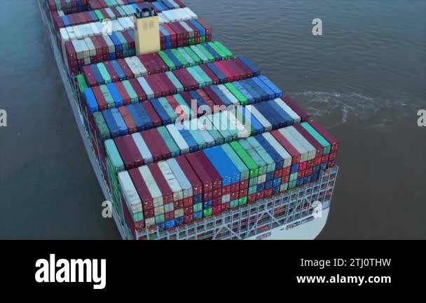 Container ship loading and in deep sea port, Aerial view of business ...