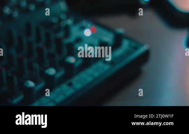 Close-up of fingers adjusting sound mixing console. Mixer console for ...
