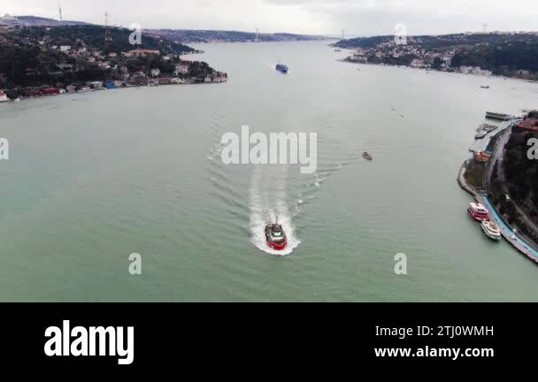 Aerial top view Container ship full load container on the green sea ...