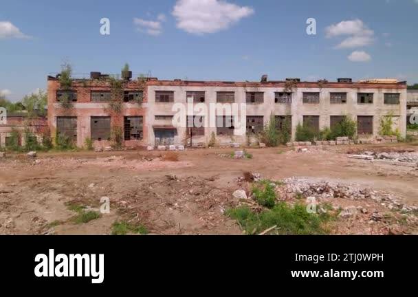 Old industrial territory. Abandoned buildings of ancient factory ...