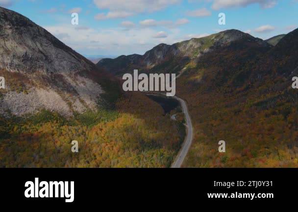 Franconia Notch with fall foliage aerial view including Profile Lake ...