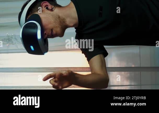 Man touching something using modern 3D virtual reality headset ...