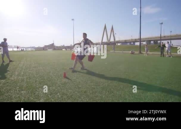 KAZAN, TATARSTAN RUSSIA - JUNE 06 2021: Athletes compete in relay race ...