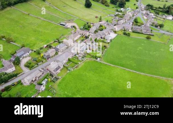 Aerial footage of the beautiful village of Thoralby in the ...