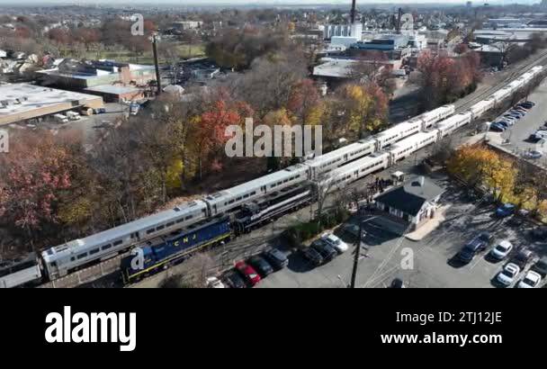 An aerial view of two trains meet each other in a railway of Clifton City Stock Video Footage ...