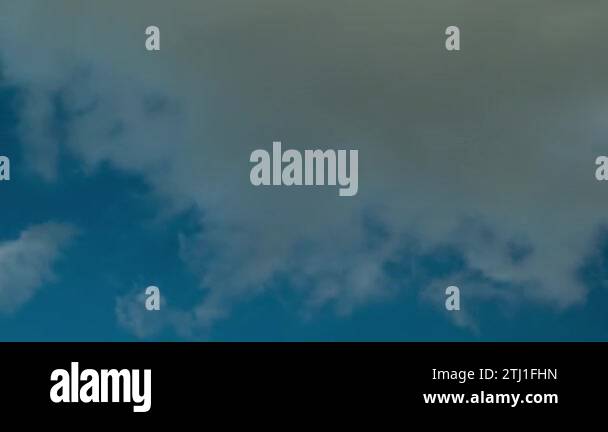 Blue sky background time lapse white clouds. Time lapse Cloudy sky. Flowing puffy clouds in the ...