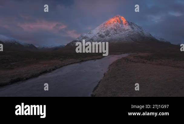 4k footage of the snowcapped Buachaille Etive Mor mountain and the Coe ...
