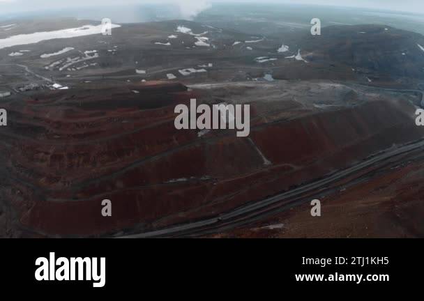 Quarry from a bird's eye view. There are winding roads between the ...