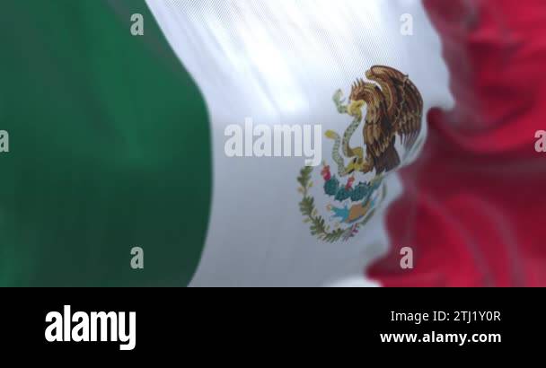 Close-up view of the mexican national flag waving in the wind. Mexico ...