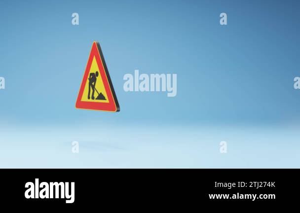 Work in Progress Warning Triangle Road-Sign Spinning on a Studio Blue ...