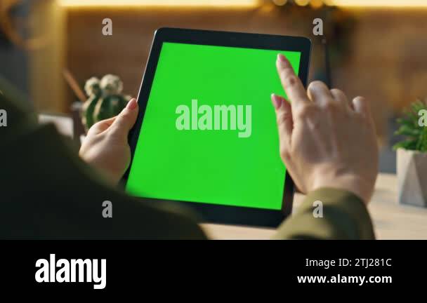 Mockup tablet worker scrolling display browsing social media at home ...