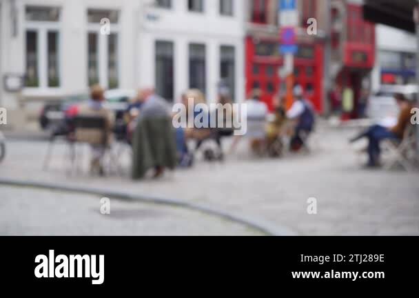 Out of focus background plate of European cafe patio street scene for ...
