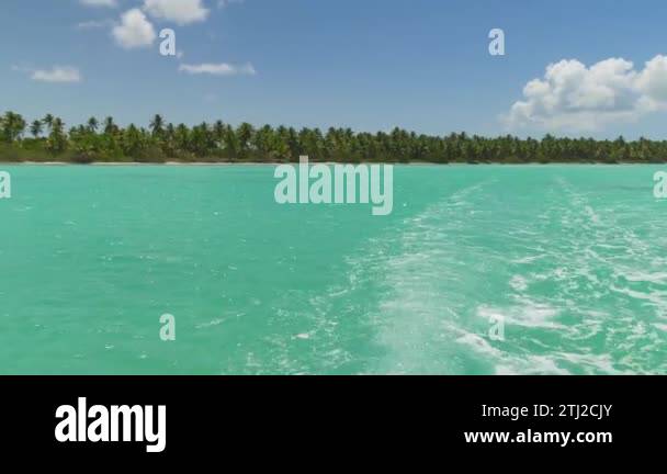 Cruise ship wake or trail on ocean surface. A wide footprint from the ...