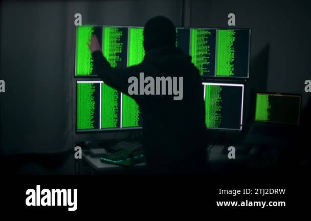 Unrecognizable Cyber Hacker Typing, Pointing and Nodding Head While ...