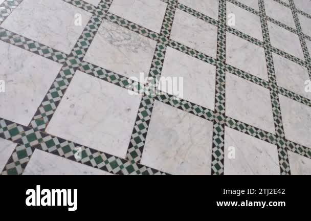 Traditional Moroccan floor with zellige mosaic tiles and marble ...