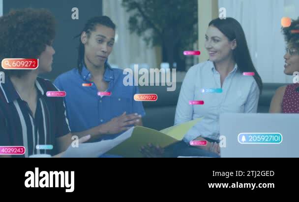 Animation of social media icons against diverse colleagues discussing ...