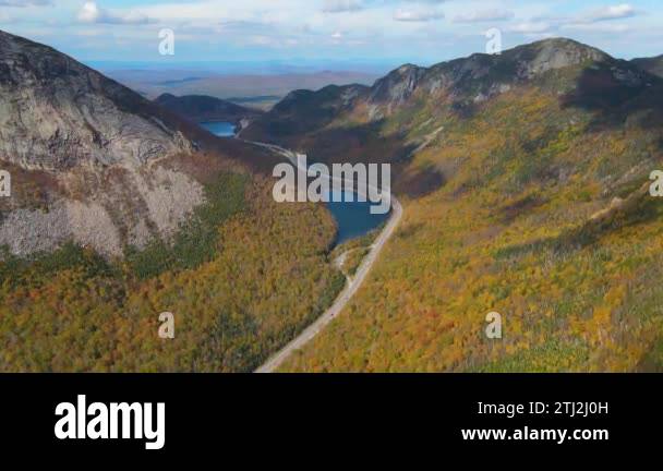 Franconia Notch with fall foliage aerial view including Profile Lake ...