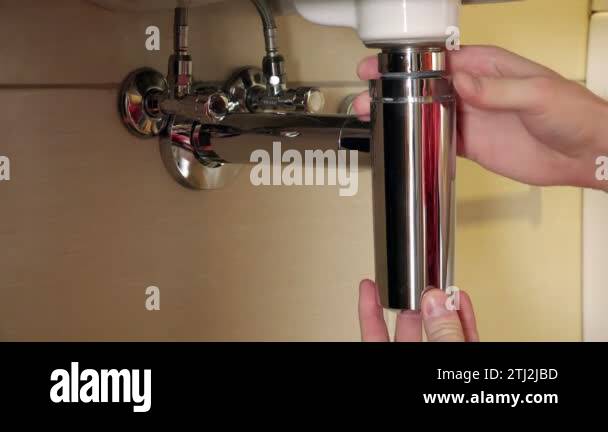 demonstration of unscrewing and removing the retaining ring but the ...