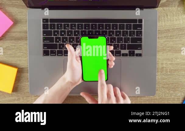 Man is showing the application green screen chroma key. Laptop and ...