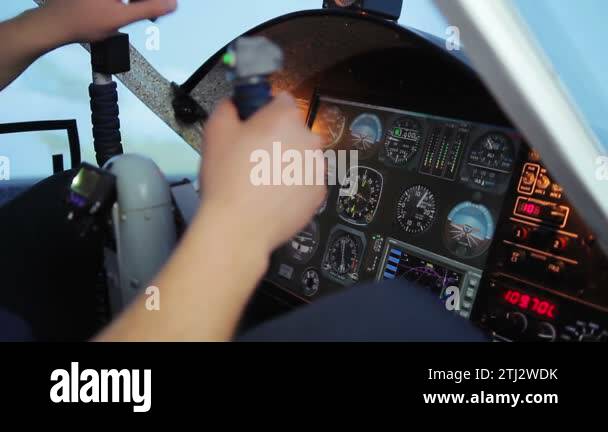 Pilot's hand knocking on breakdown cockpit panel, flight control system ...