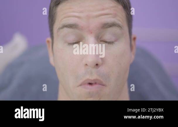 Disoriented man with red spots on face after getting botox injections ...