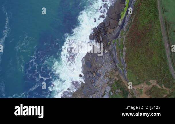 Drone footage shows the beautiful view of the Cantabrian island of Isla ...