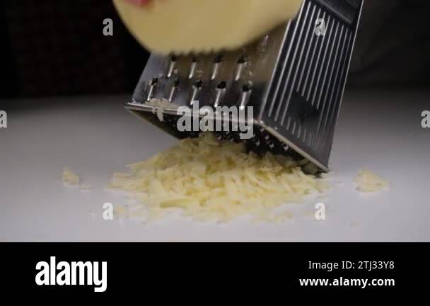 cheddar cheese, master grates cheddar cheese, slowmotion Stock Video ...
