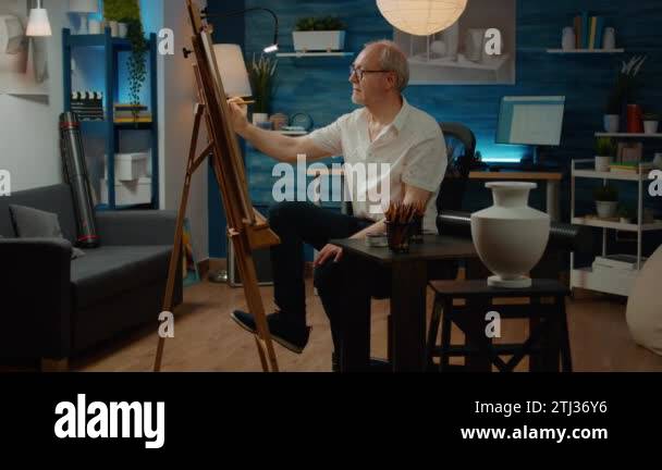 Old person with creative skills drawing vase design for hobby with art ...
