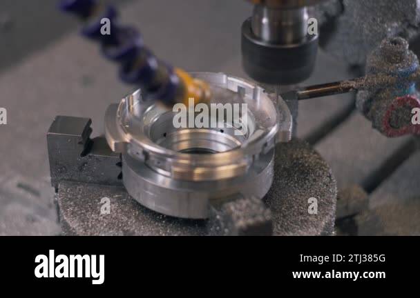 Close up shot of professional milling machine working on factory ...