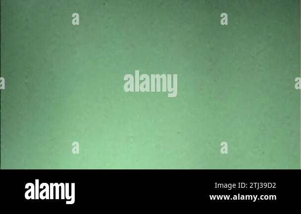 Glitch grain analog noise. Old TV effect. Green black real static ...