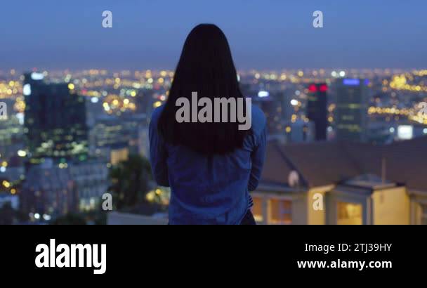 City, buildings and woman thinking while looking at urban skyline ...