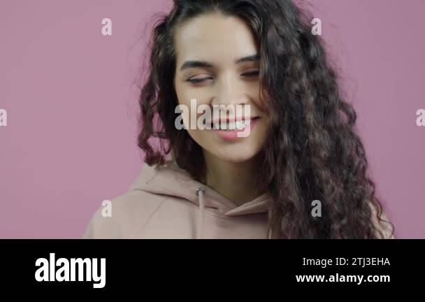 Close-up portrait of cute young lady showing ok hand gesture and ...