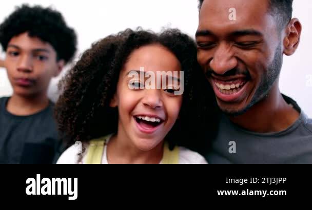 Siblings love care and affection. Older brother kissing little sister ...