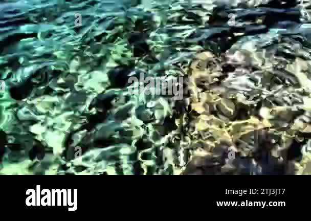 A surreal abstract shifting background reminiscent of rippling water ...