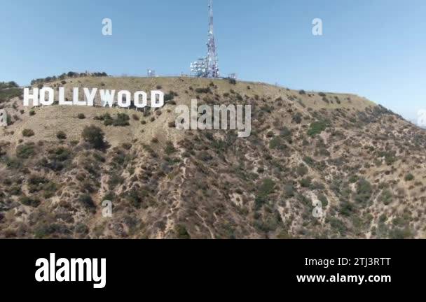 A medium distance, slowly moving horizontal shot of the Hollywood sign ...