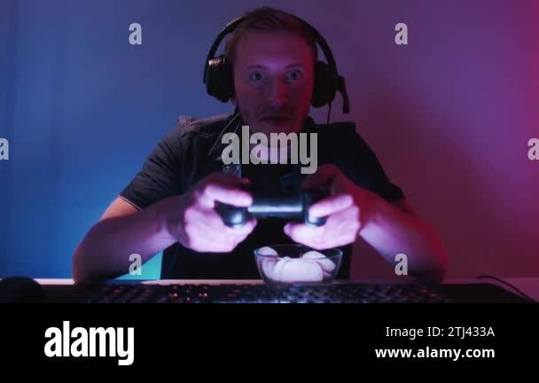 Home gaming. Professional player. Cybersport tournament. Excited man ...