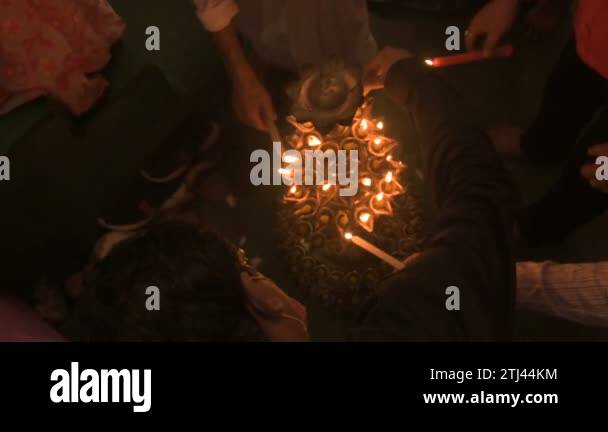 Howrah, India- October 15th, 2021 : Holy 108 lamps are being lit during ...