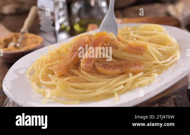 Spaghetti with bottarga. Typical Sardinian Cuisine. A dish with ...