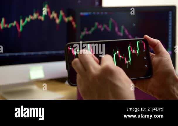 Stock market graph phone Stock Videos & Footage - HD and 4K Video Clips ...